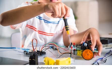 Asian Kid Boy Assembling Arduino Robot Stock Photo Shutterstock