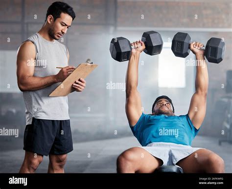 Fitness Body Builder And Weight Coach Or Personal Trainer With