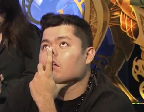 Guy Rubbing His Snout