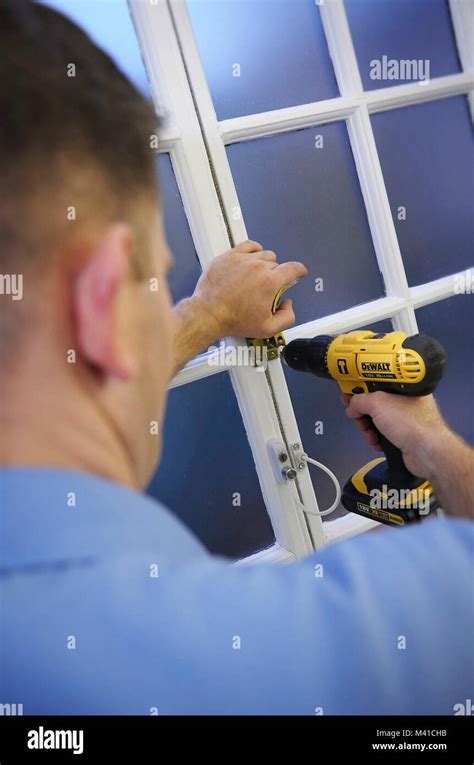 Installing Window Hi Res Stock Photography And Images Alamy