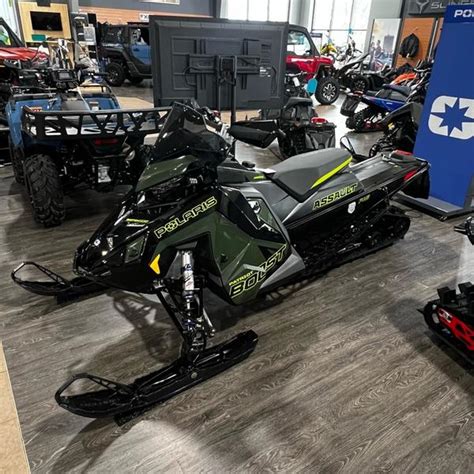 2024 Polaris® Patriot Boost Switchback Assault 146 Premium Army Green Power Pac Equipment