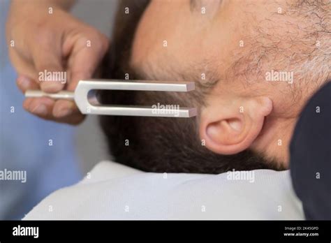 Music Therapist With Tuning Fork Stock Photo Alamy