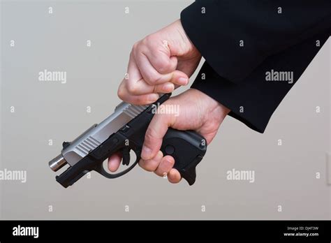 Woman Loading Gun Hi Res Stock Photography And Images Alamy