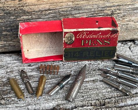 A Vintage R Esterbrook Pen Nib Box With Various Nibs Such As Mitchell S Script Pen Size