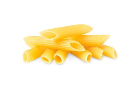 Premium Photo Heap Of Cylindrical Ribbed Pasta Isolated On White