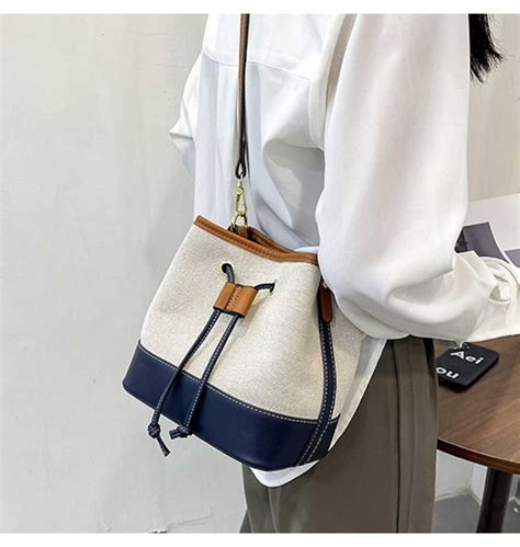 보드미 복조리백 미니 캔버스 버킷백 여자 복조리 가방 정장 크로스백 티몬