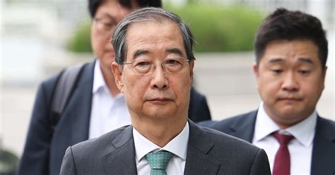 한덕수 내란 특검 출석…취재진 질문에 침묵