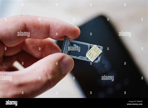 Inserting Sd Memory Card High Resolution Stock Photography And Images Alamy