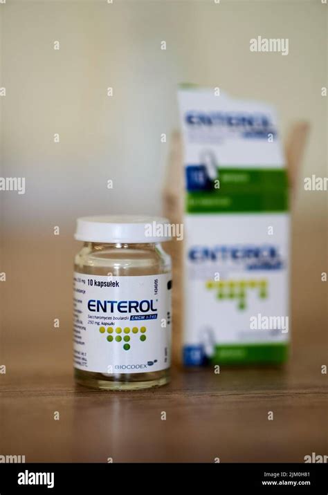 A Vertical Shot Of Enterol Brand Probiotics Capsules In A Glass