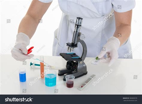 Female Doctor Using Microscope Medical Laboratory Stock Photo Shutterstock