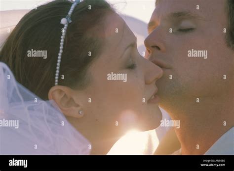 Caucasian Bride Groom Kissing Stock Photo Alamy