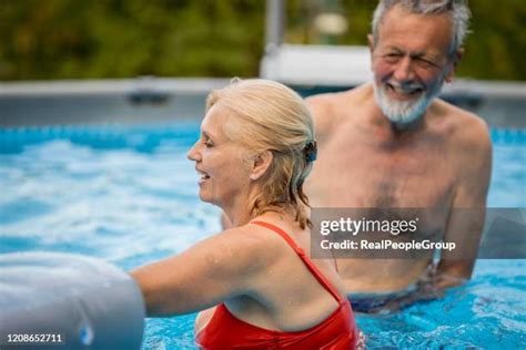 Senior Couple In Bath Together Laughing Photos And Premium High Res