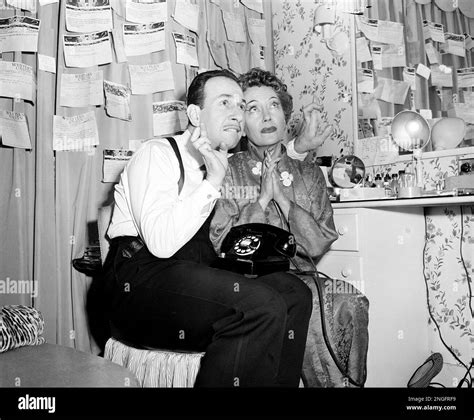 Oscar Nominees Jose Ferrer And Gloria Swanson Cross Their Fingers As They Wait For News From