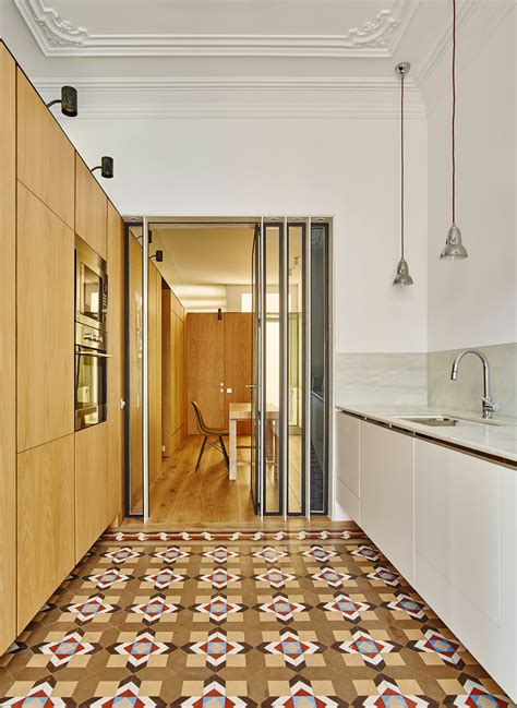 Built Architecture Uses Oak Cabinets To Reorganise Barcelona Flat