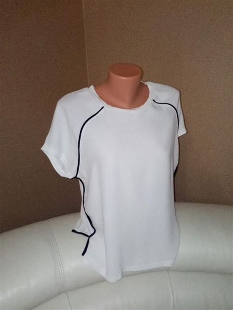 Футболка — ціна 230 грн у каталозі Футболки Купити жіночі речі за доступною ціною на Шафі