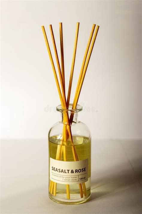 An Aroma Diffuser With Aromatic Oil And Sticks In The Room Creates An Atmosphere Of Peace And