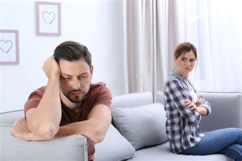 Couple Ignoring Each Other After Argument In Living Room Stock Image Image Of Problems