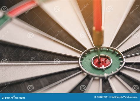 The Red Arrow In The Middle Of The Dart Board Shown Success The Concept Of Setting Business