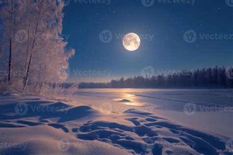 Full Moon Shines On Winter Landscape Snow Covered Ground And Frozen