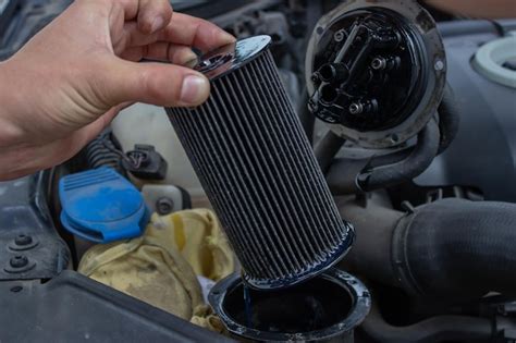 Premium Photo Car Repair Fuel Filter Replacement