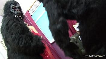 Nothing Makes These Blonde Chicks Happier Than Pleasing Two Guys In Gorilla Suits By Sucking
