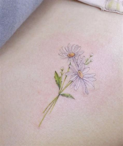 25 Daisy Tattoo Ideas 2025 With Fine Line Watercolor Minimalist