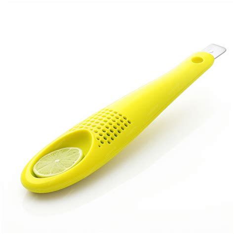Premium Photo Lemon Zester On A White Background
