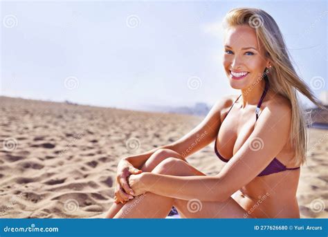 Beach Beauty Portrait Of An Attractive Young Blonde Woman Relaxing At