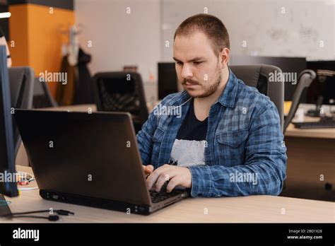Authentic Programmer Working On Desktop Pc Programming Code