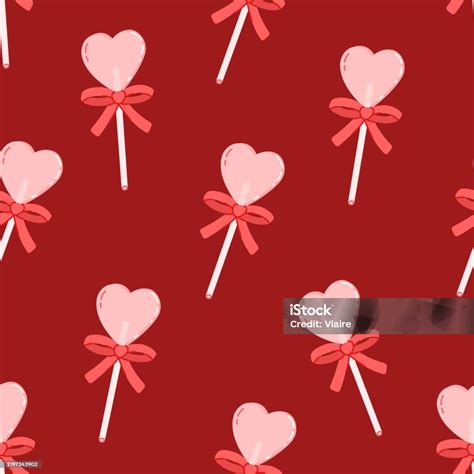 리본 활이 있는 하트 모양의 카라멜 롤리팝이 있는 완벽 한 패턴입니다 달콤한 사탕 스틱의 휴일 배경입니다 해피 발렌타인 데이