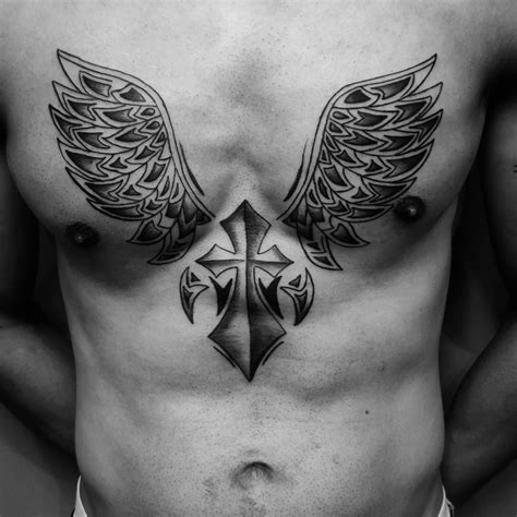 Cross And Wings Tattoo Chest Design Meaning Style And Placement