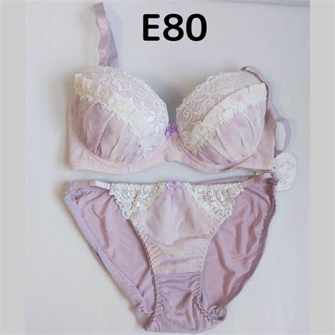 E80 ブラジャーandショーツ 上下セット 淡い紫 フリル レース リボン 新品 By メルカリ