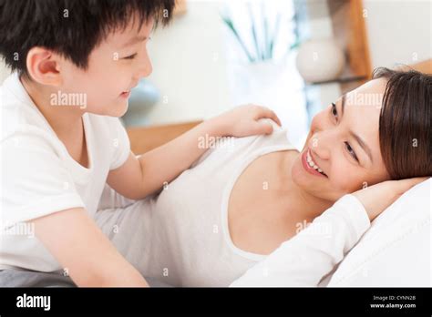 Tender Moment Between Mother And Son Stock Photo Alamy
