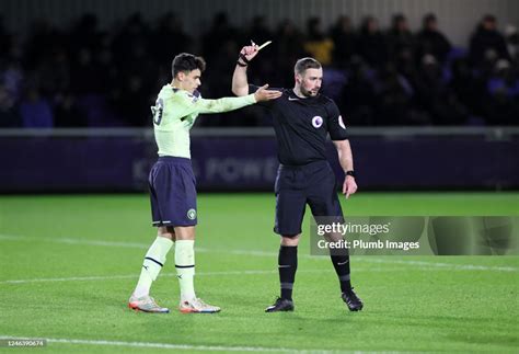 Referee Greg Rollason Shows A Yellow Card To Alex Robertson Of News Photo Getty Images