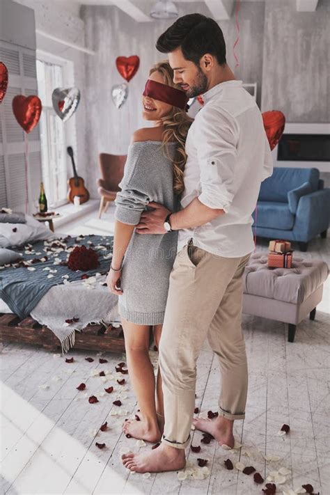 Celebrating Anniversary Full Length Of Young Woman Standing Blindfold