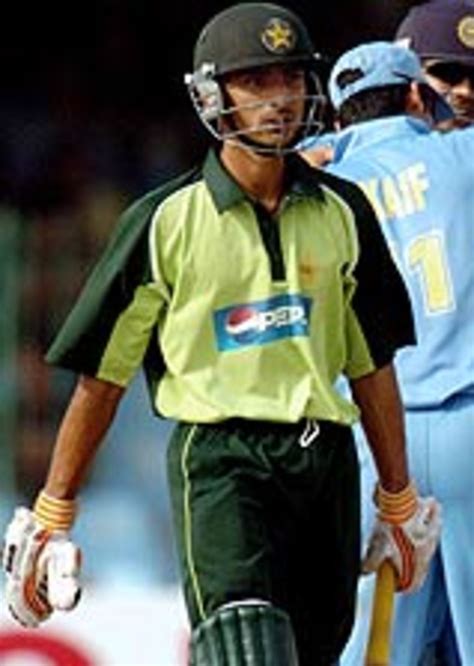 yasir hameed walks back despondently after being dismissed