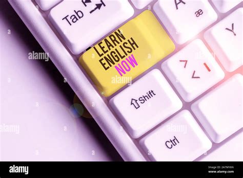 Writing Note Showing Learn English Now Business Concept For Gain Or
