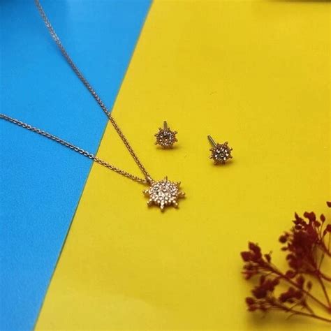 خرید و قیمت ست گردنبند و گوشواره طرح خورشید رنگ ثابت جنس عالی کد 07 ترب