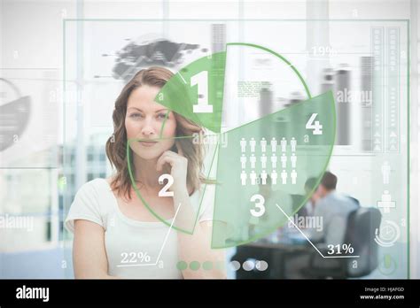 blonde businesswoman using green pie chart interface with colleagues
