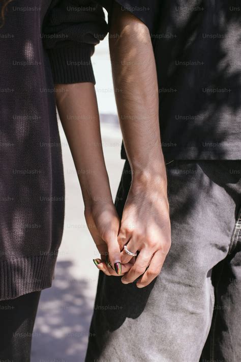 Couple Holds Hands Showing Affection And Love Photo Hands Image On