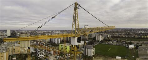 Drone Shot Of A Crane Working On A Construction Site Stock Image Image Of Dangerous Space