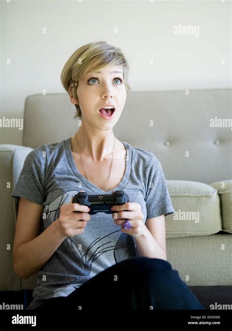 Woman Holding A Video Game Controller Stock Photo Alamy