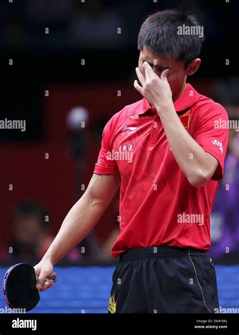 Zhang Jike Of China Reacts After Loosing A Point During His Semifinal Match Of The World Team