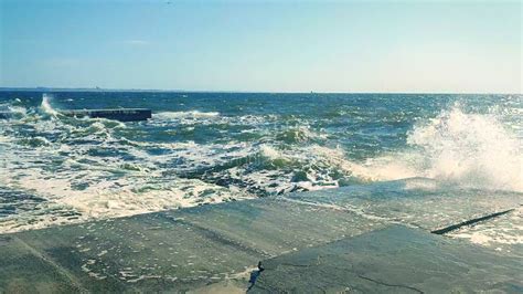 Storm Storm At Sea Large High Sea Waves White Foam Hitting Concrete Pier Wall Stock Footage