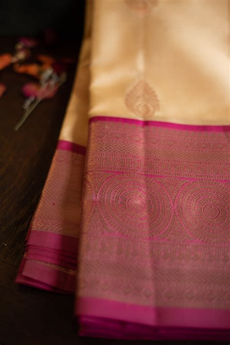 Cream Kanchipuram Silk Saree With Simple Border