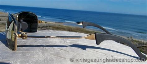 Ray-Ban W2308 Orbs Axis Square Gold Mirror Sunglasses