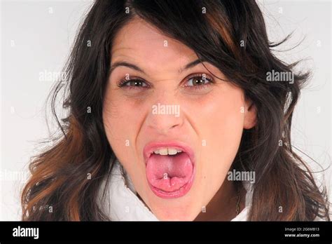 Clover Tongue Or Upwards Rolled Tongue Woman Sticking Her Tongue Out