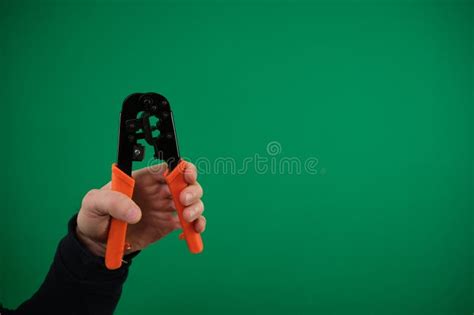 Tool For Crimping Rj 45 Connectors Twisted Pair Crimper For Crimping Connectors On A Green