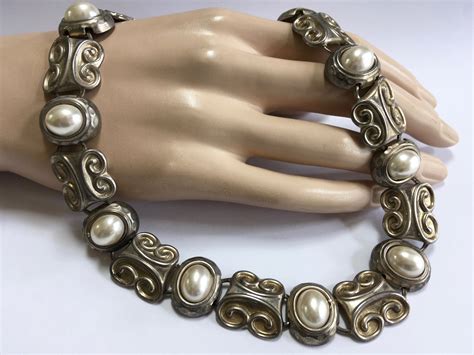 Ionic Scroll Necklace Textured Scrolls And Pearl Cabochon Etsy Ionic Scroll Necklace Textured Scrolls And Pearl Cabochon Etsy