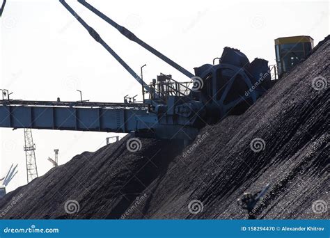 Stacker Reclaimer During Loading And Unloading Of Coal Coal Heaps At A